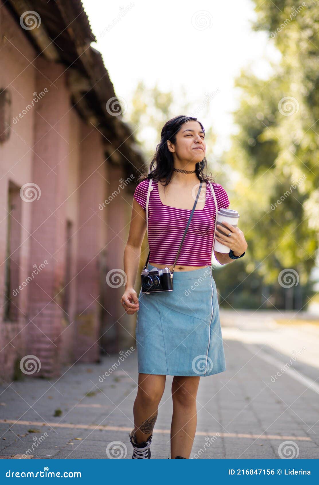Woman Walking Trough Street with Camera Stock Photo - Image of activity ...