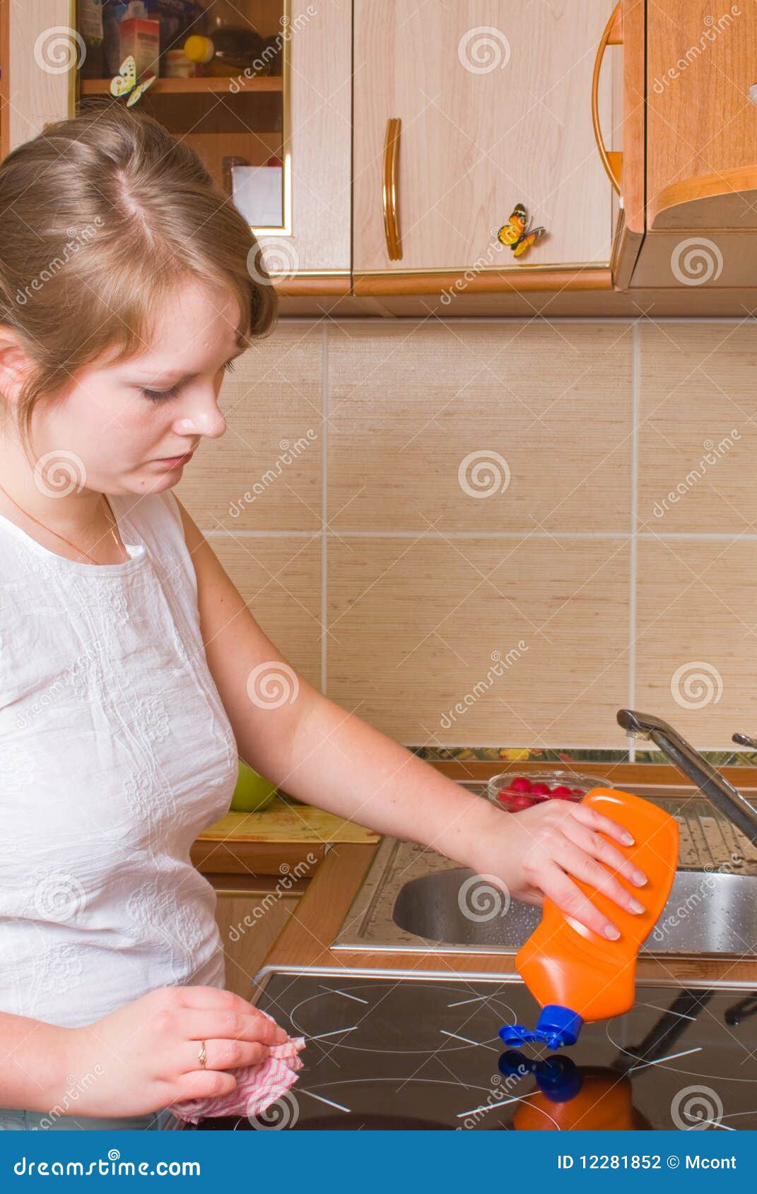 The girl washes a plate stock photo. Image of clean, home - 12281852