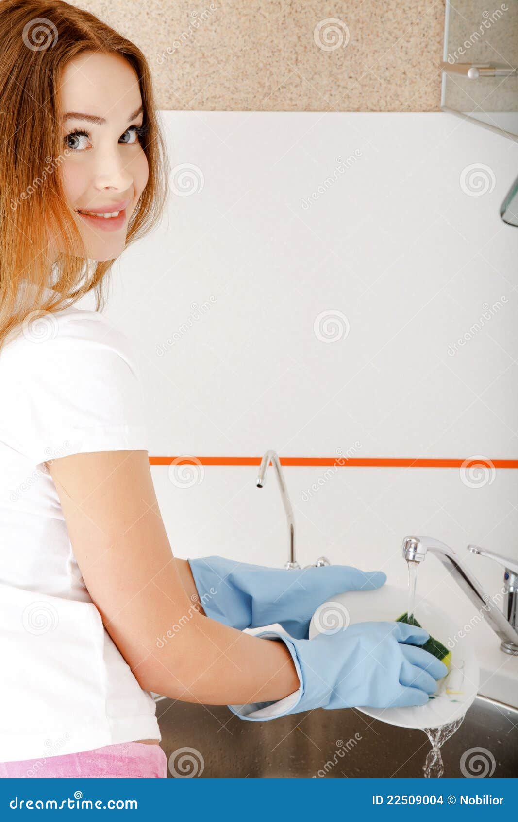 Girl washing a plate stock photo. Image of adult, care - 22509004