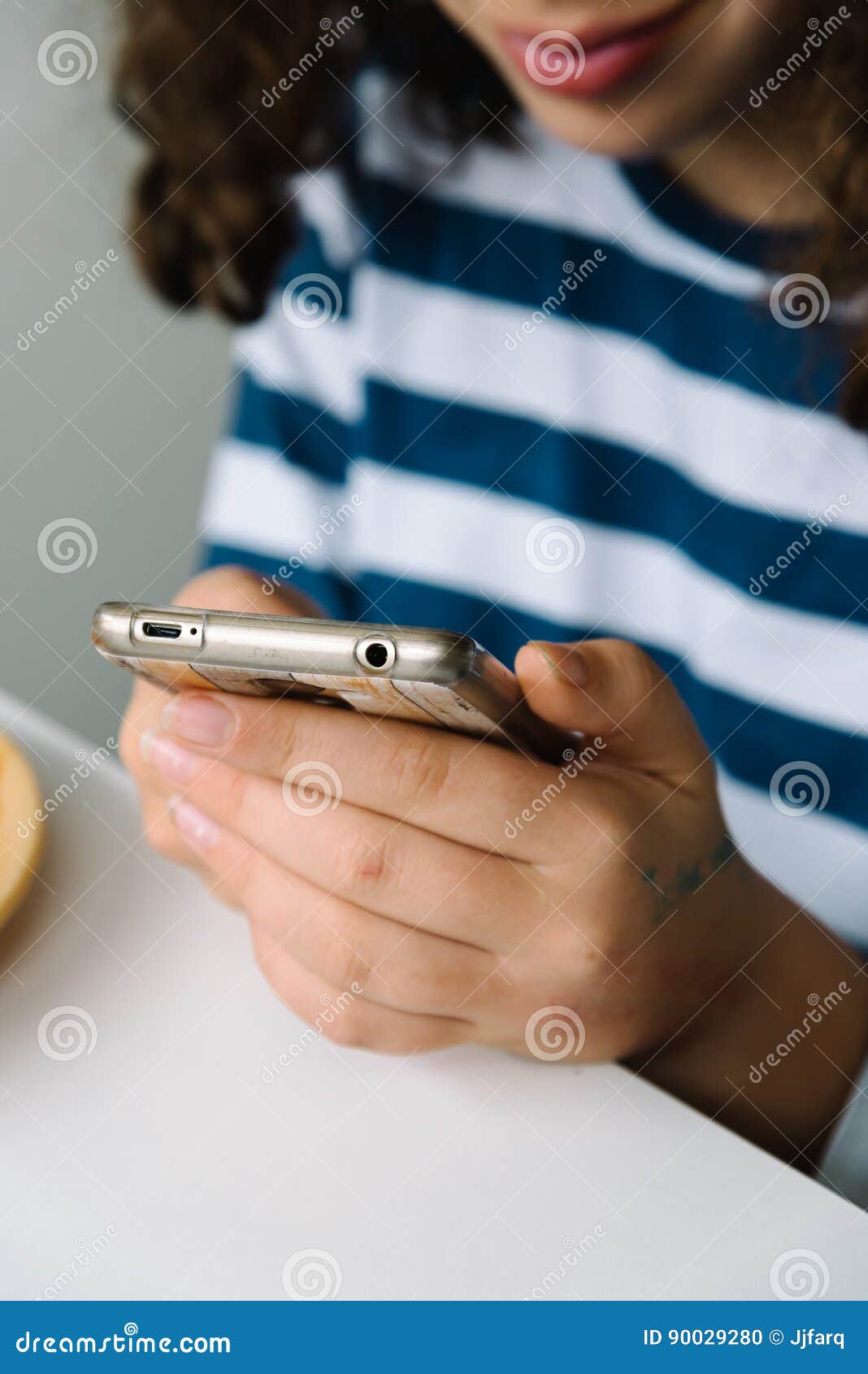 Girl Watching Her Smartphone Stock Photo - Image of girl, hungry: 90029280