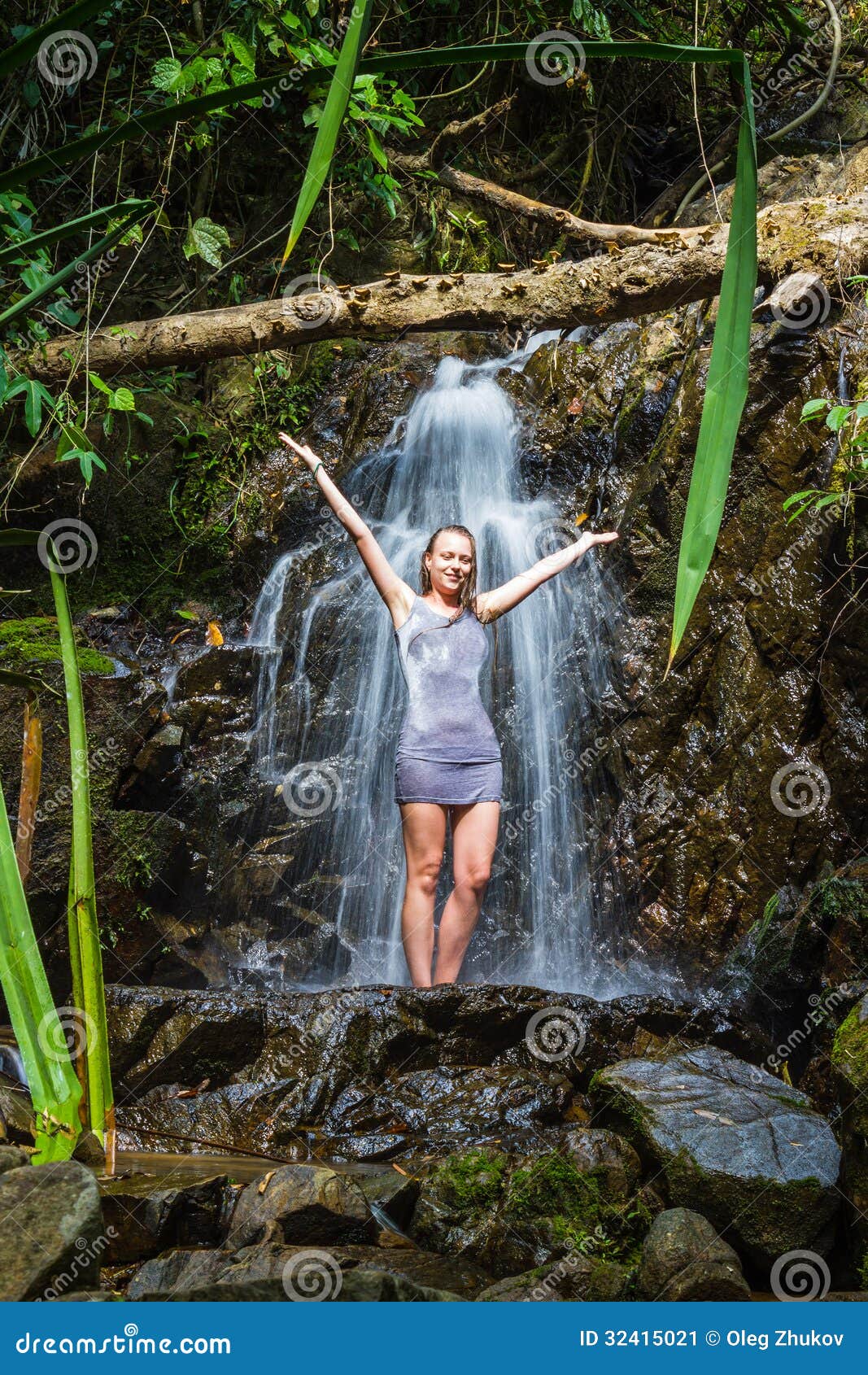 Girl in the waterfall stock image. Image of male, blonde - 32415021