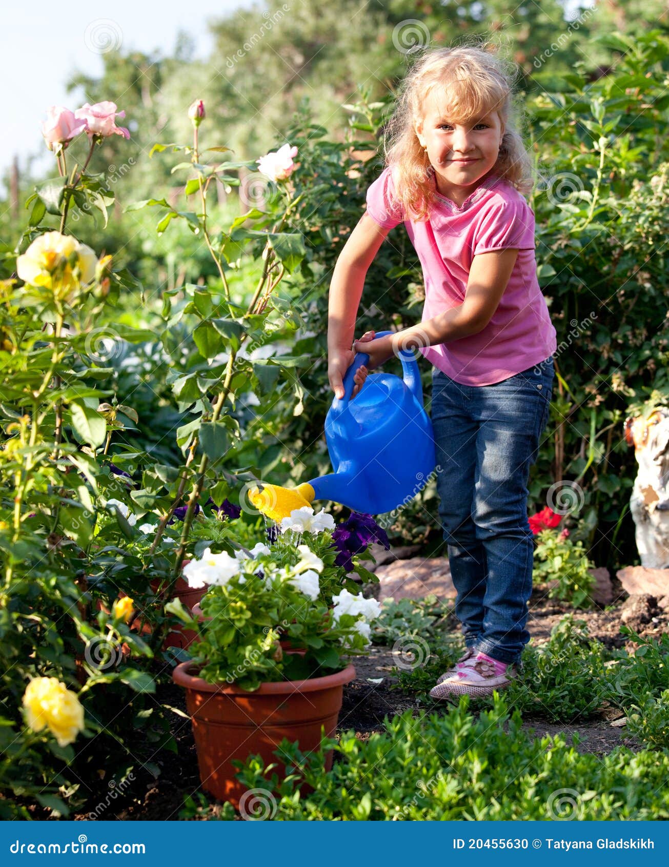Girl Watering Flowers are Watered from Stock Photo - Image of nature ...