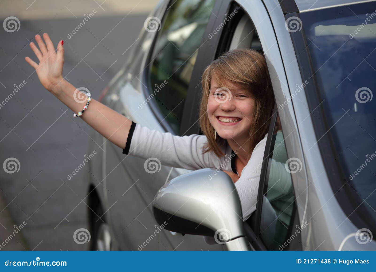 Waving Goodbye From Car