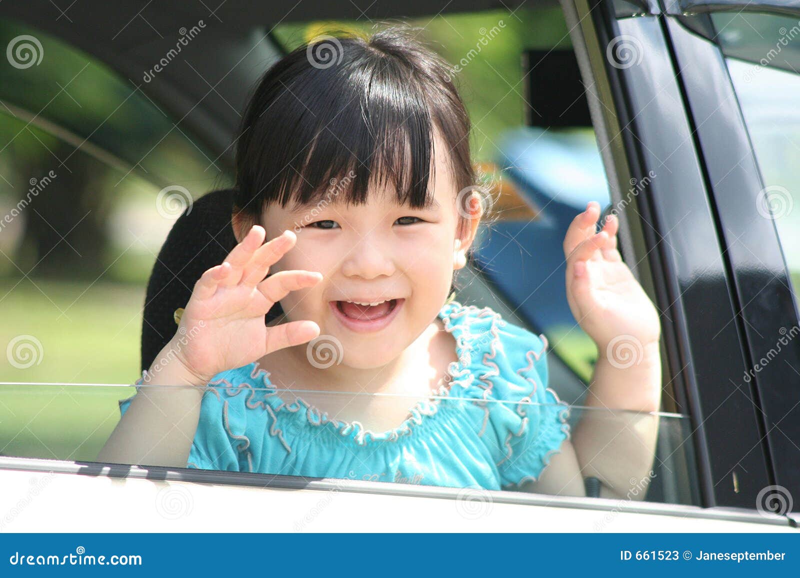Waving Goodbye From Car