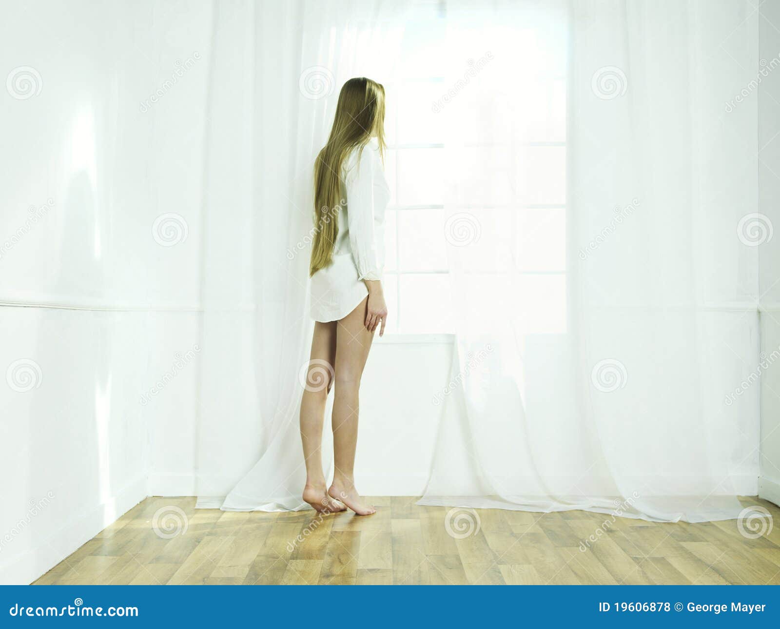 Girl at the window stock photo. Image of comfort, beautiful - 19606878