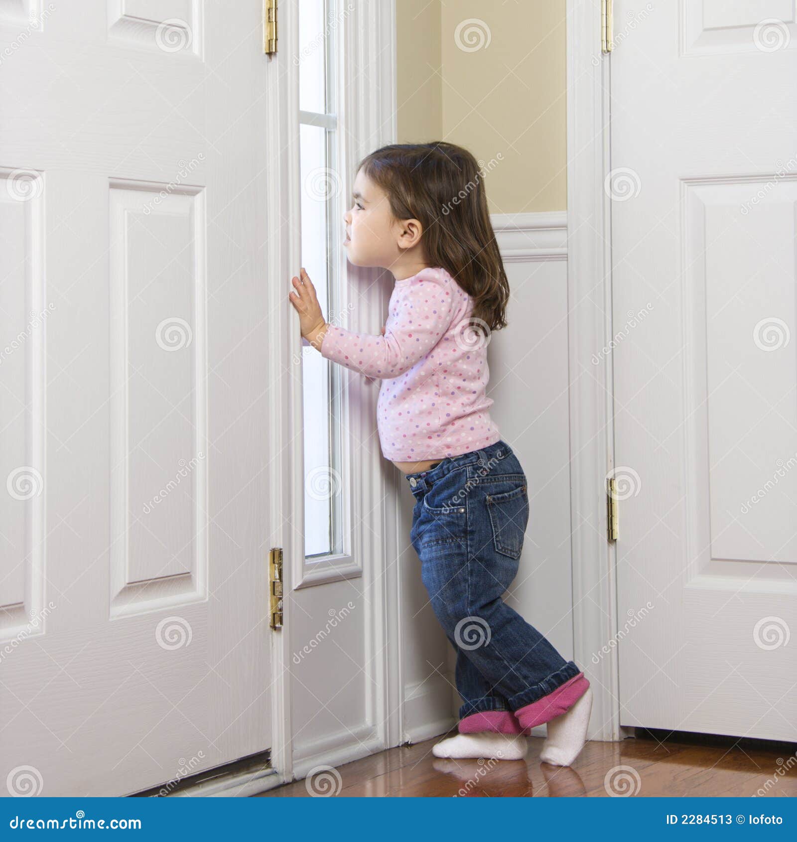 Girl at window. stock image. Image of peering, indoors - 2284513