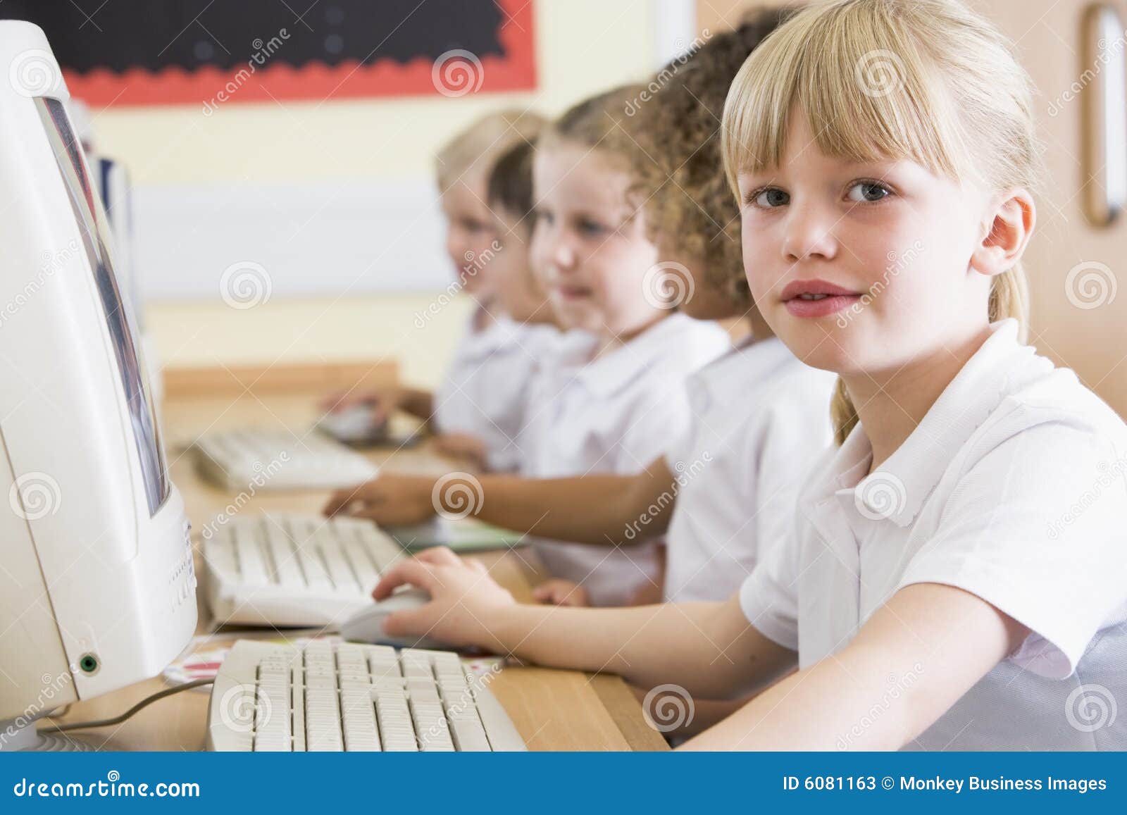 Girl Working on a Computer at Primary School Stock Image - Image of ...