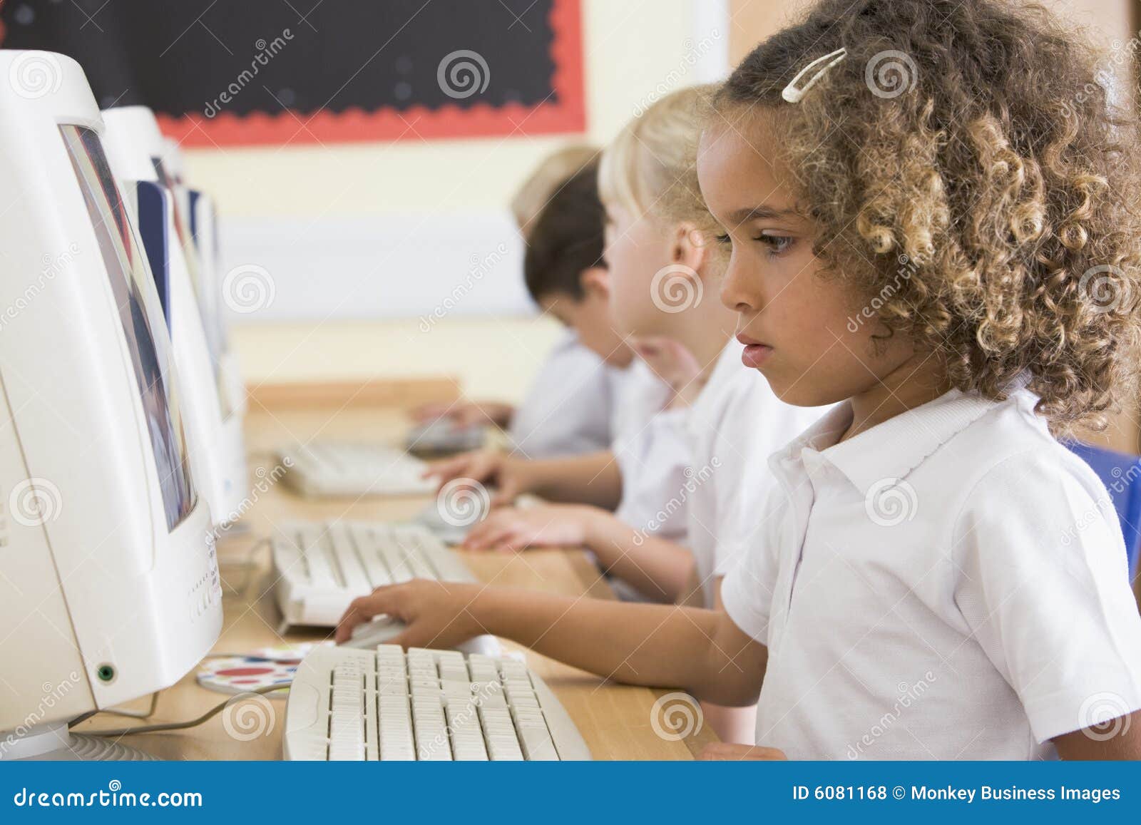 Girl Working on a Computer at Primary School Stock Photo - Image of ...