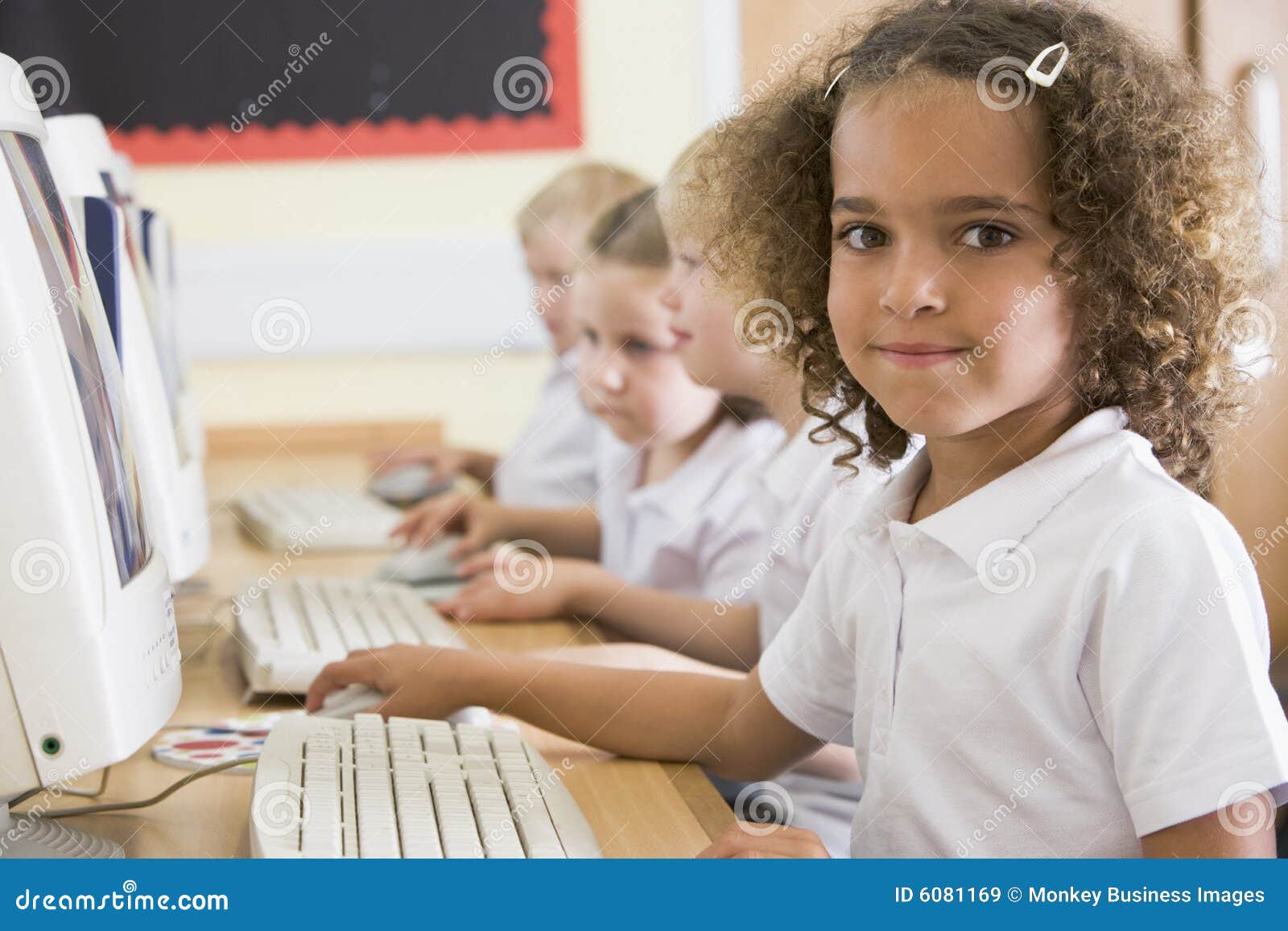 Girl Working on a Computer at Primary School Stock Image - Image of ...