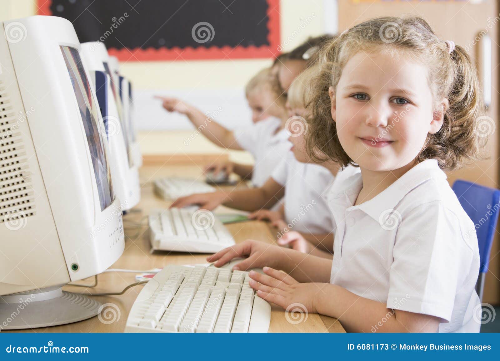 Girl Working on a Computer at Primary School Stock Image - Image of ...