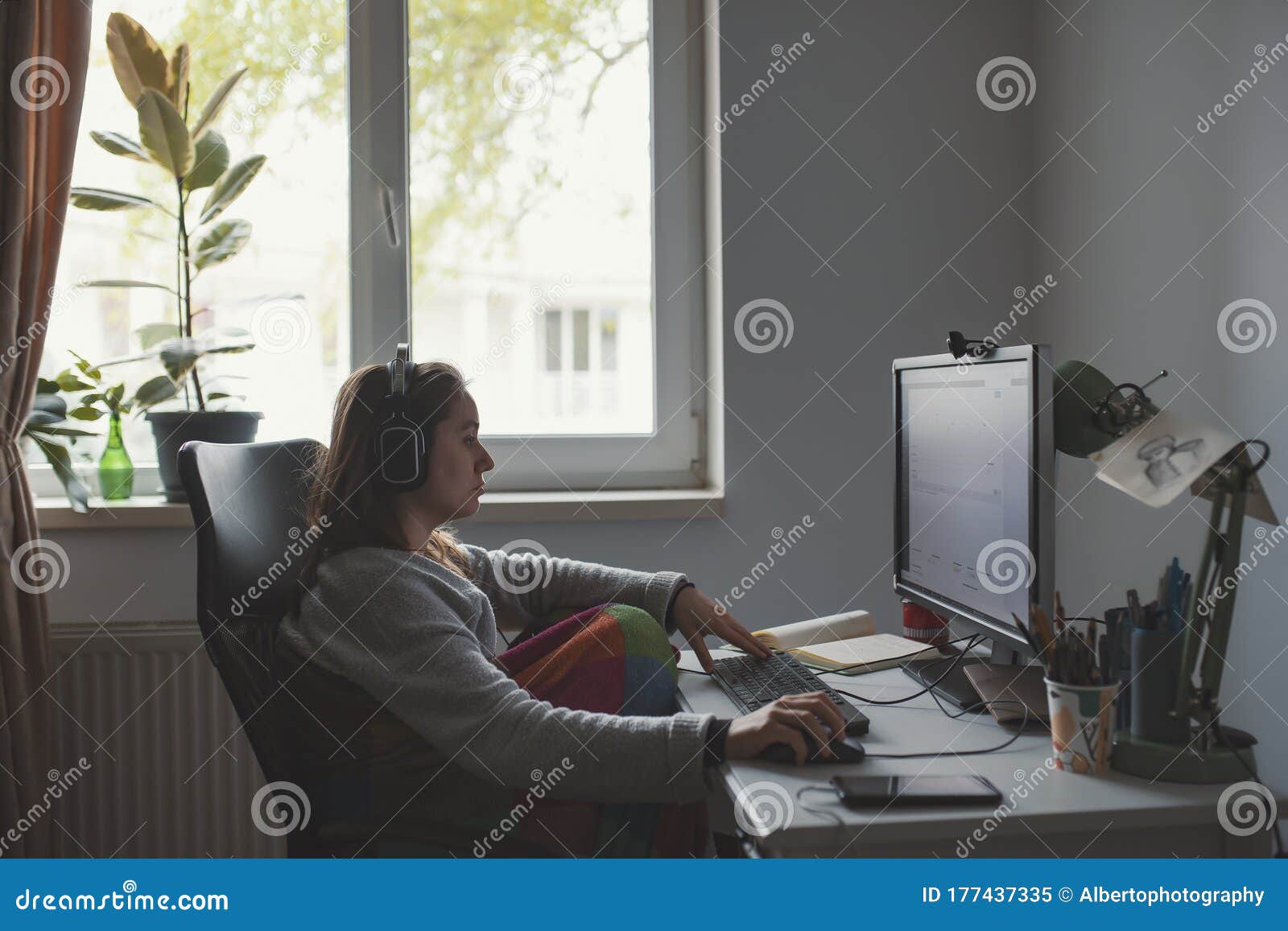 Girl working from home stock image. Image of casual - 177437335