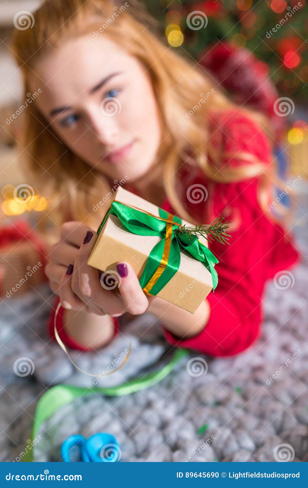 Girl wrapping gift box stock photo. Image of charming - 89645690
