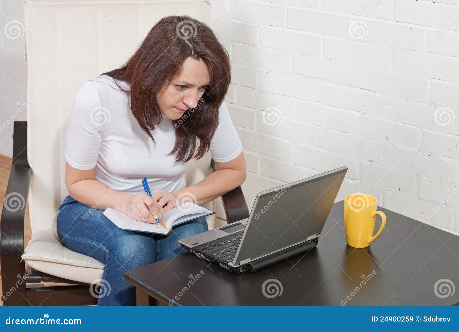 Girl writes in a diary stock image. Image of attractive - 24900259