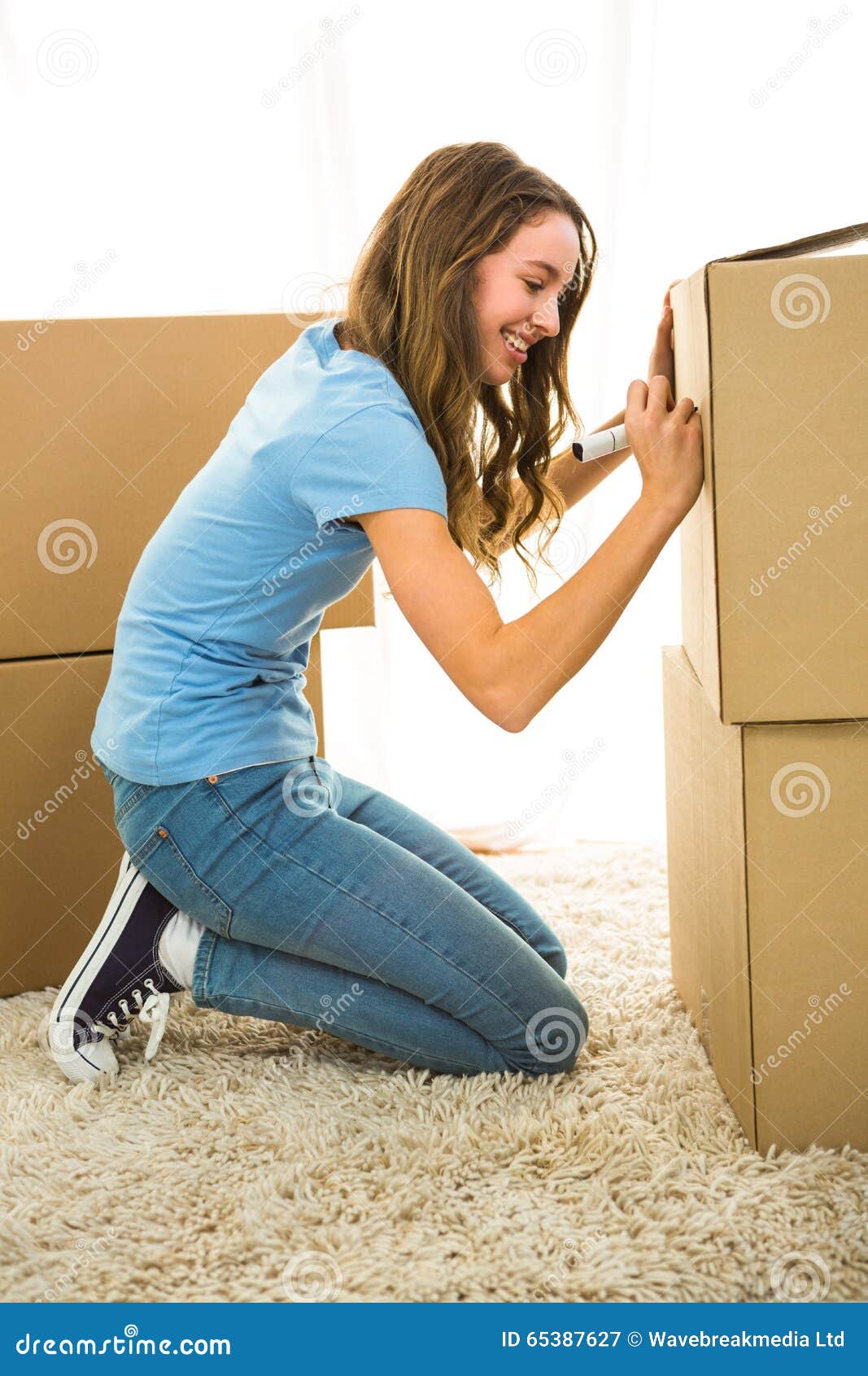 Girl writing on boxes stock image. Image of black, caucasian - 65387627