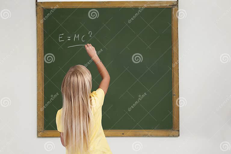 Girl Writing on a Chalkboard Stock Photo - Image of explaining ...