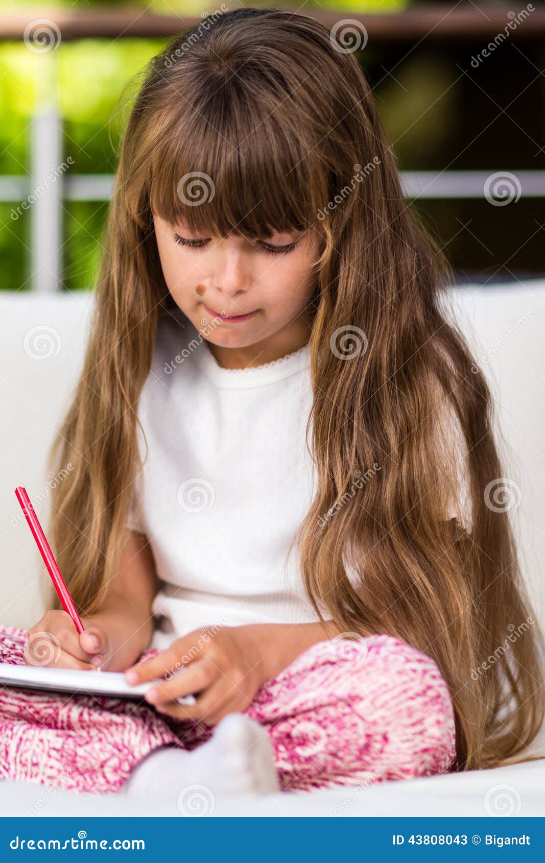 Girl Writing at Her Notepad Stock Image - Image of outdoors, pencil ...