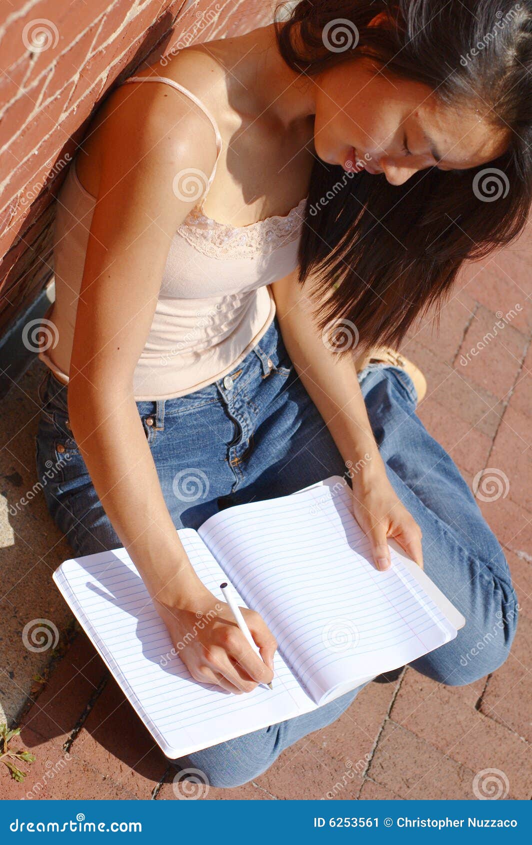 Girl Writing in Note Book stock image. Image of blank - 6253561