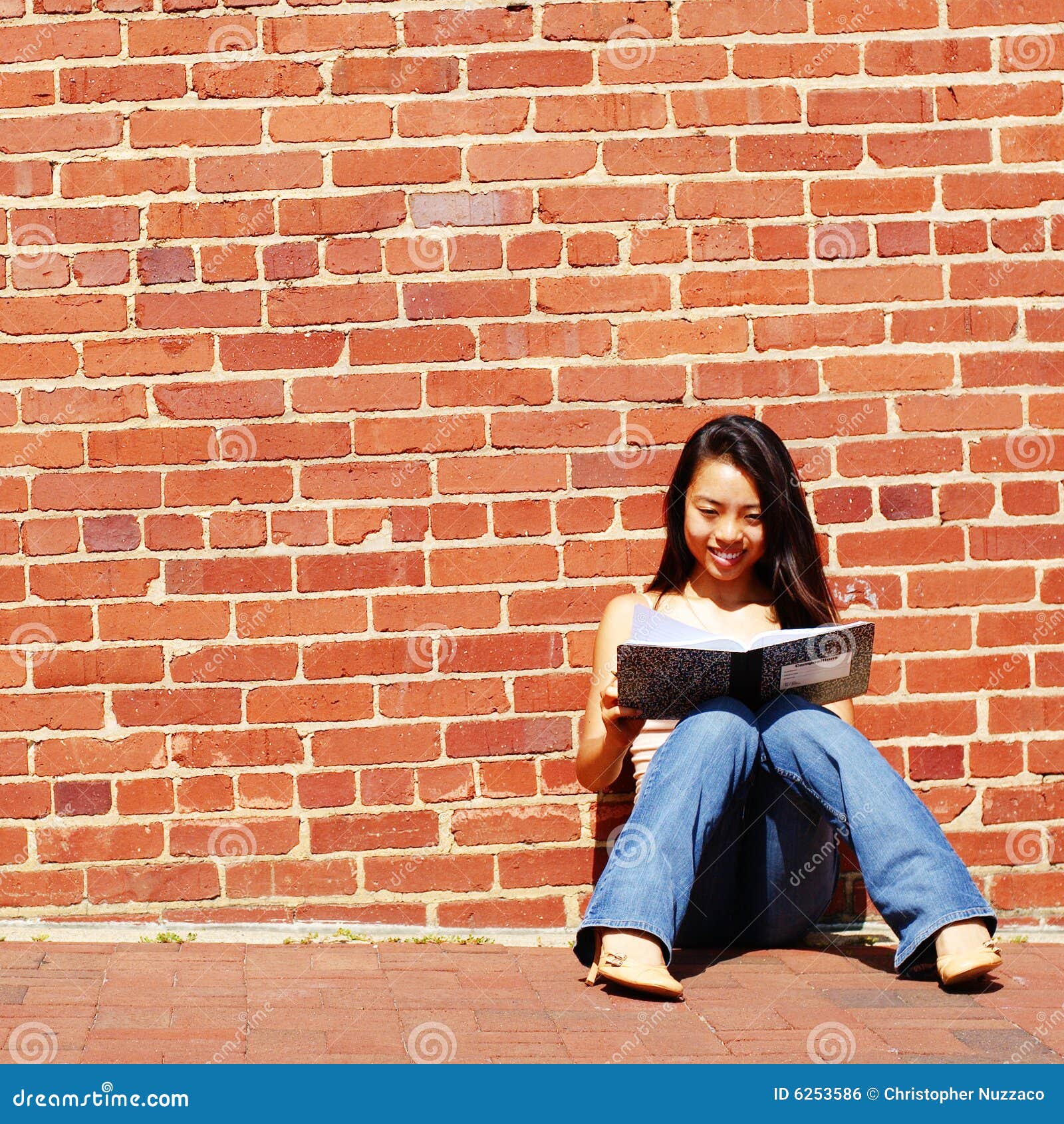 Girl Writing in Note Book stock photo. Image of shirt - 6253586
