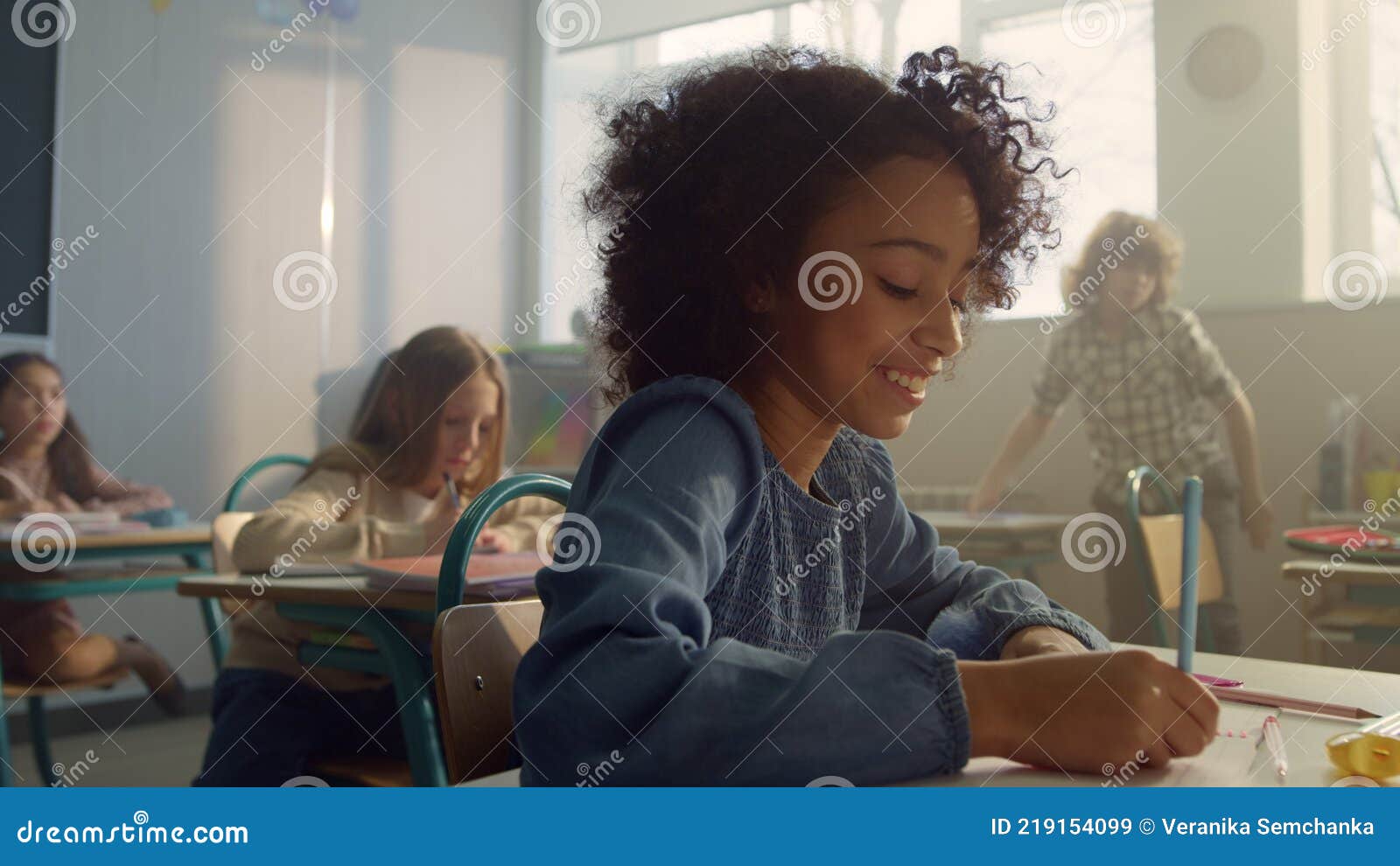 Girl Writing in Notebook during Lesson. Student Making Notes in ...