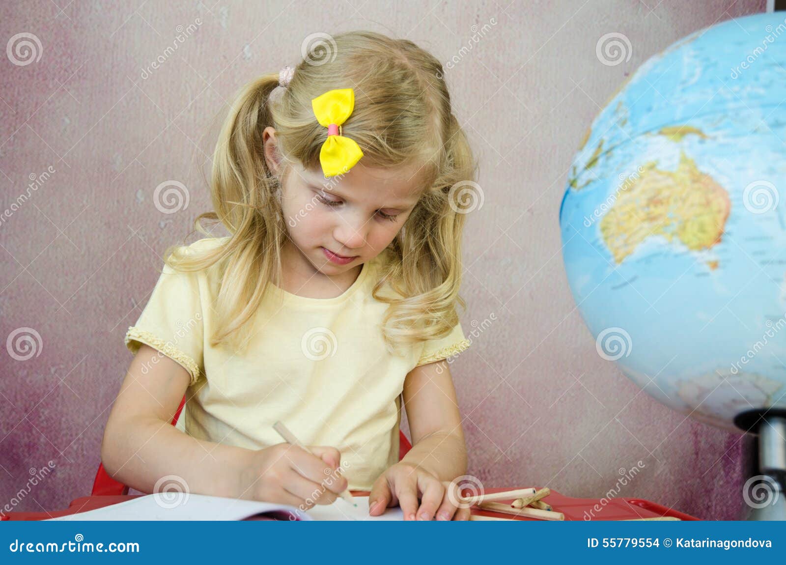 Girl writing into notepad stock photo. Image of education - 55779554