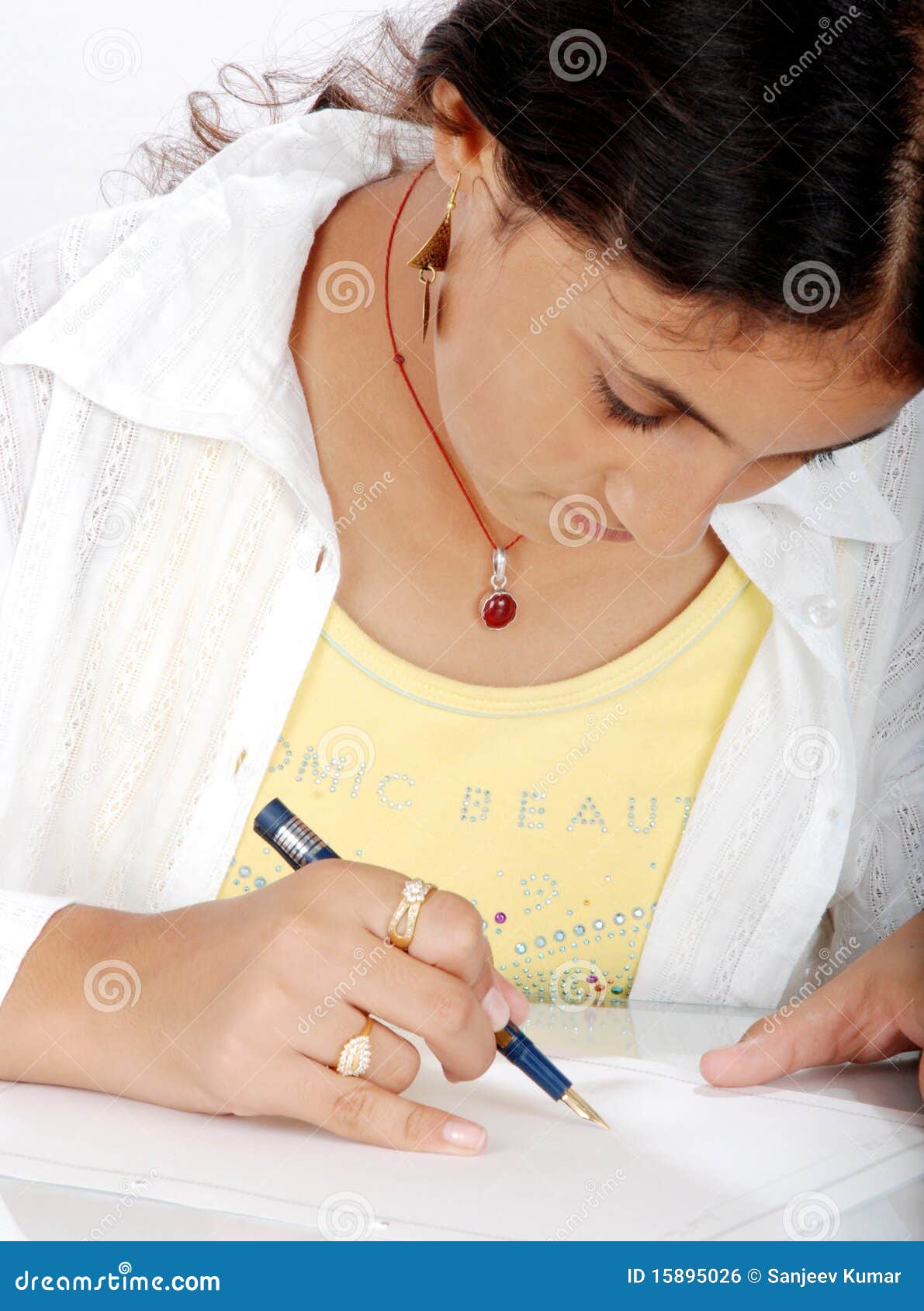 Girl writing with pen stock photo. Image of fingers, writing - 15895026