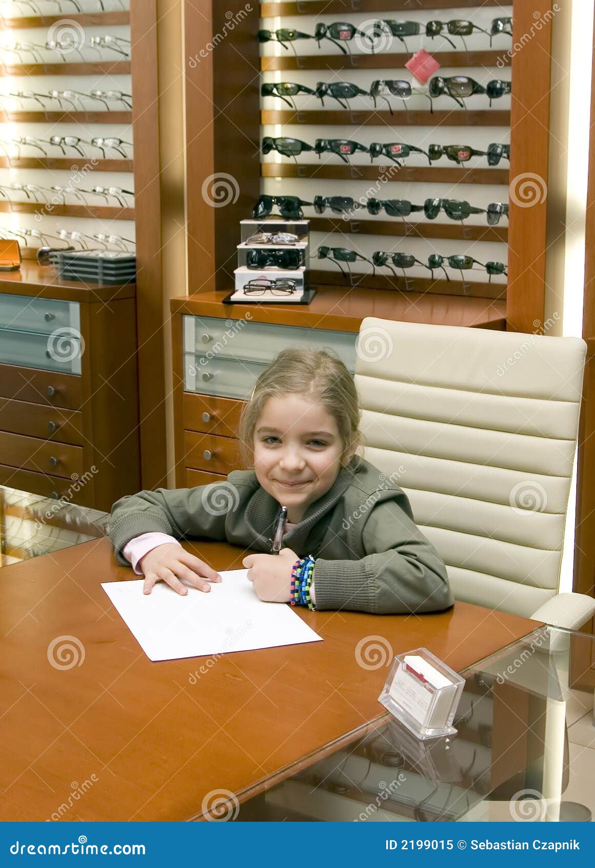 Girl Writing At Table Royalty-Free Stock Photo | CartoonDealer.com #2199015