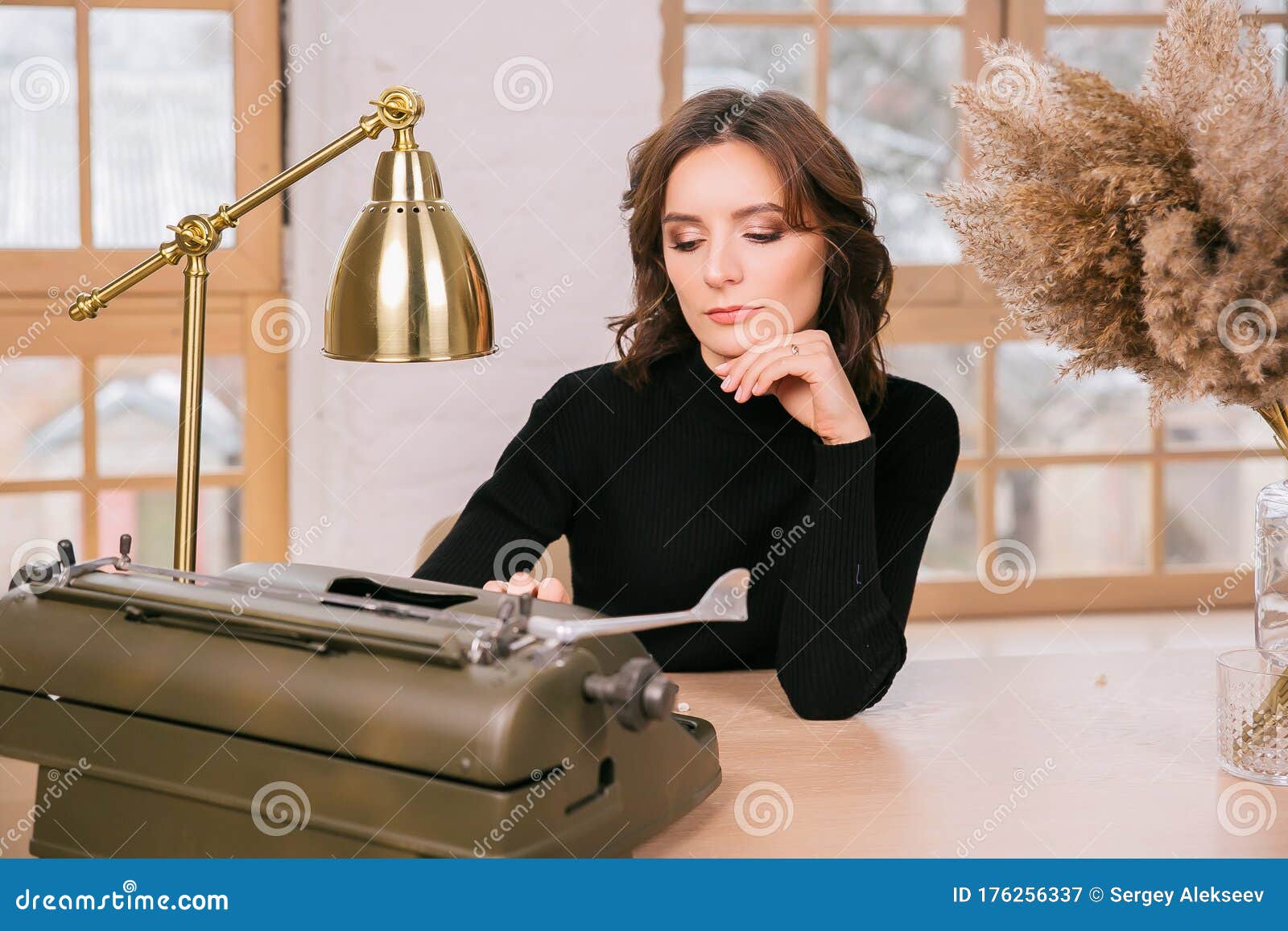 Girl at the writing table stock image. Image of adult - 176256337