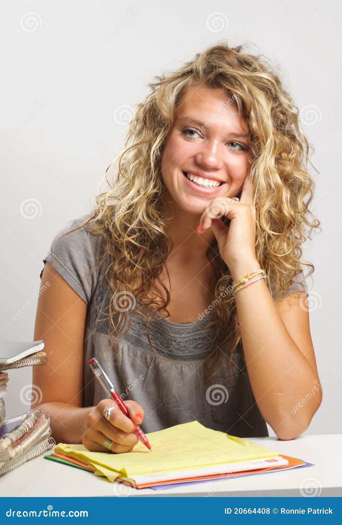 Girl Writing while Thinking Stock Photo - Image of teenager, writing ...