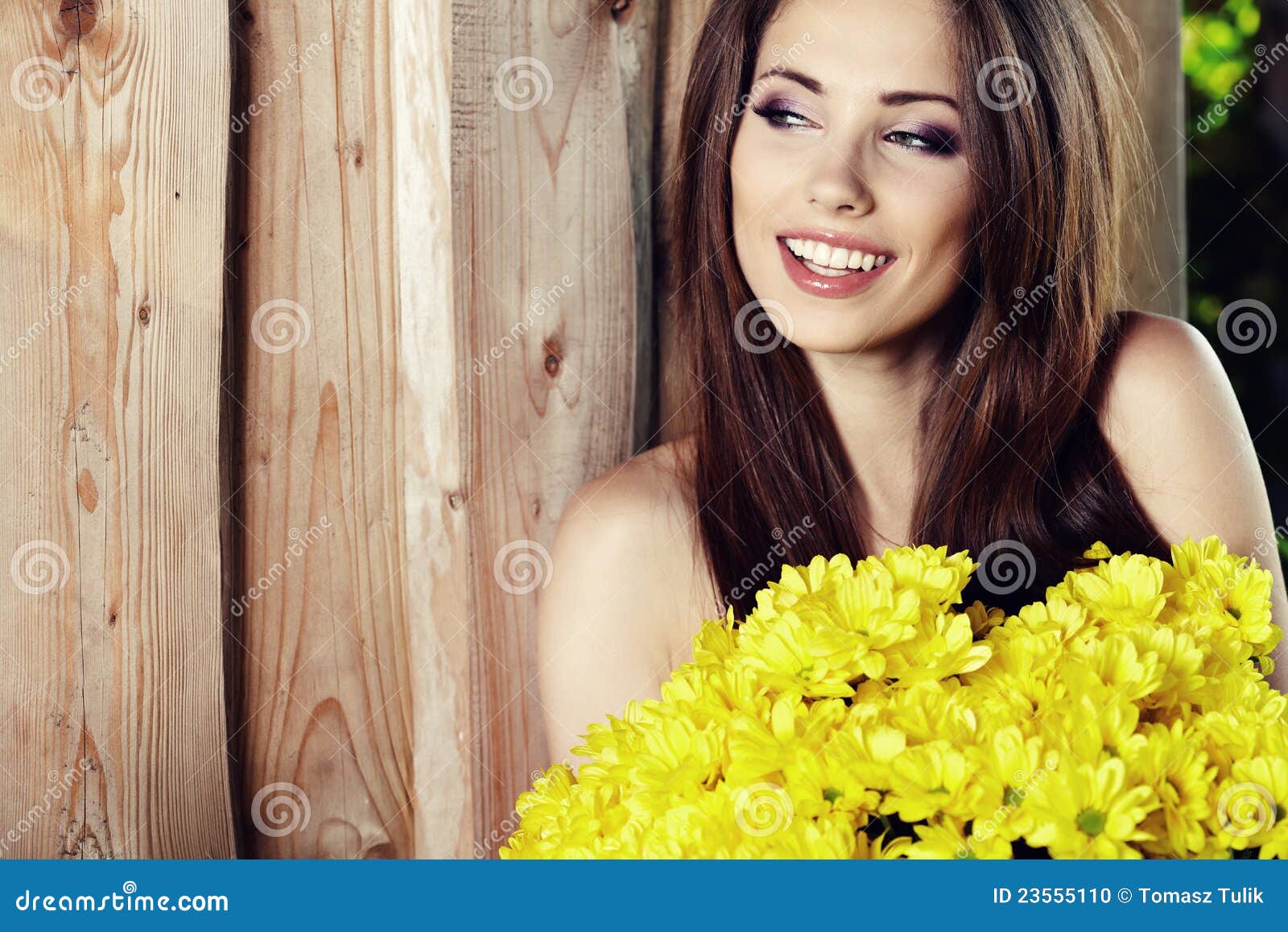 Girl with Yellow Flowers Smiling Stock Photo - Image of happy, hair ...