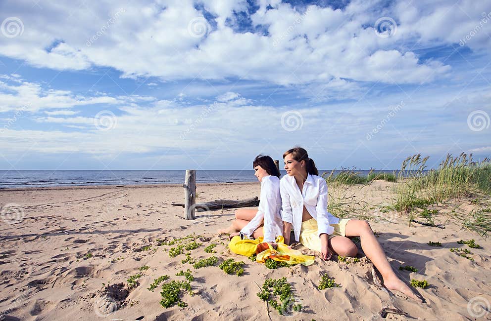 Girlfriends on a beach. stock photo. Image of girl, friendship - 20053208