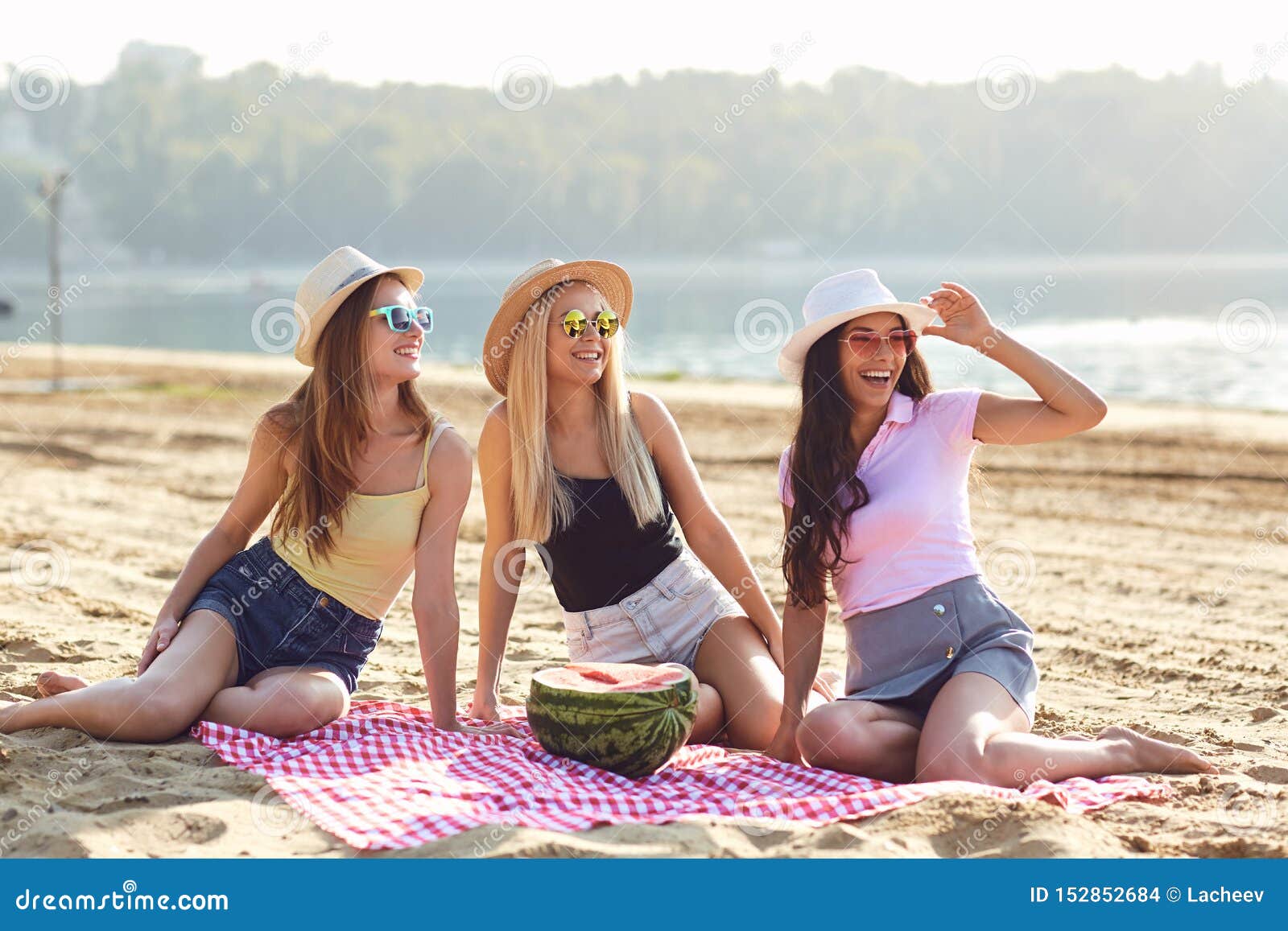 Girlfriends on the Beach in the Park. Stock Photo - Image of sand ...