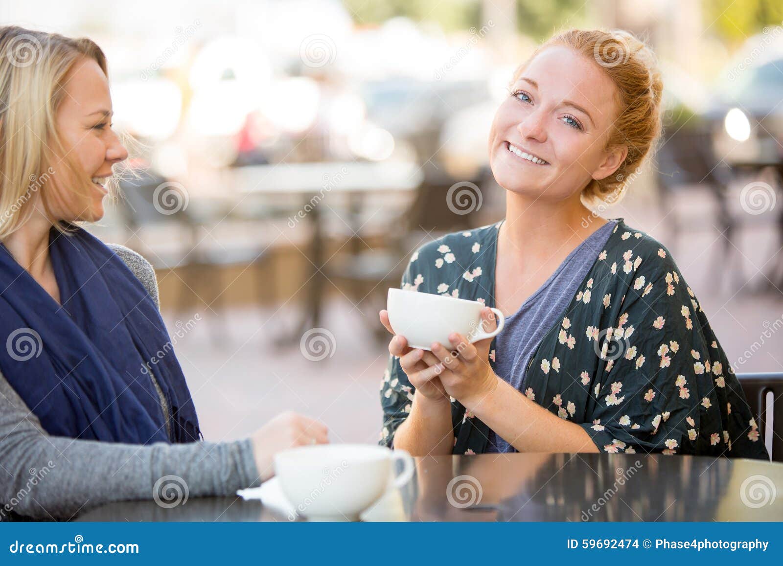 Girlfriends coffee stock photo. Image of coffee, listen - 59692474