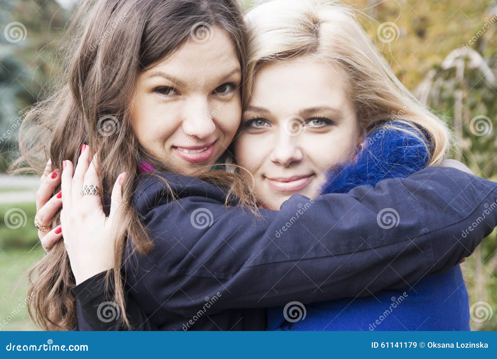 Girlfriends hug stock image. Image of friends, cute, cold - 61141179
