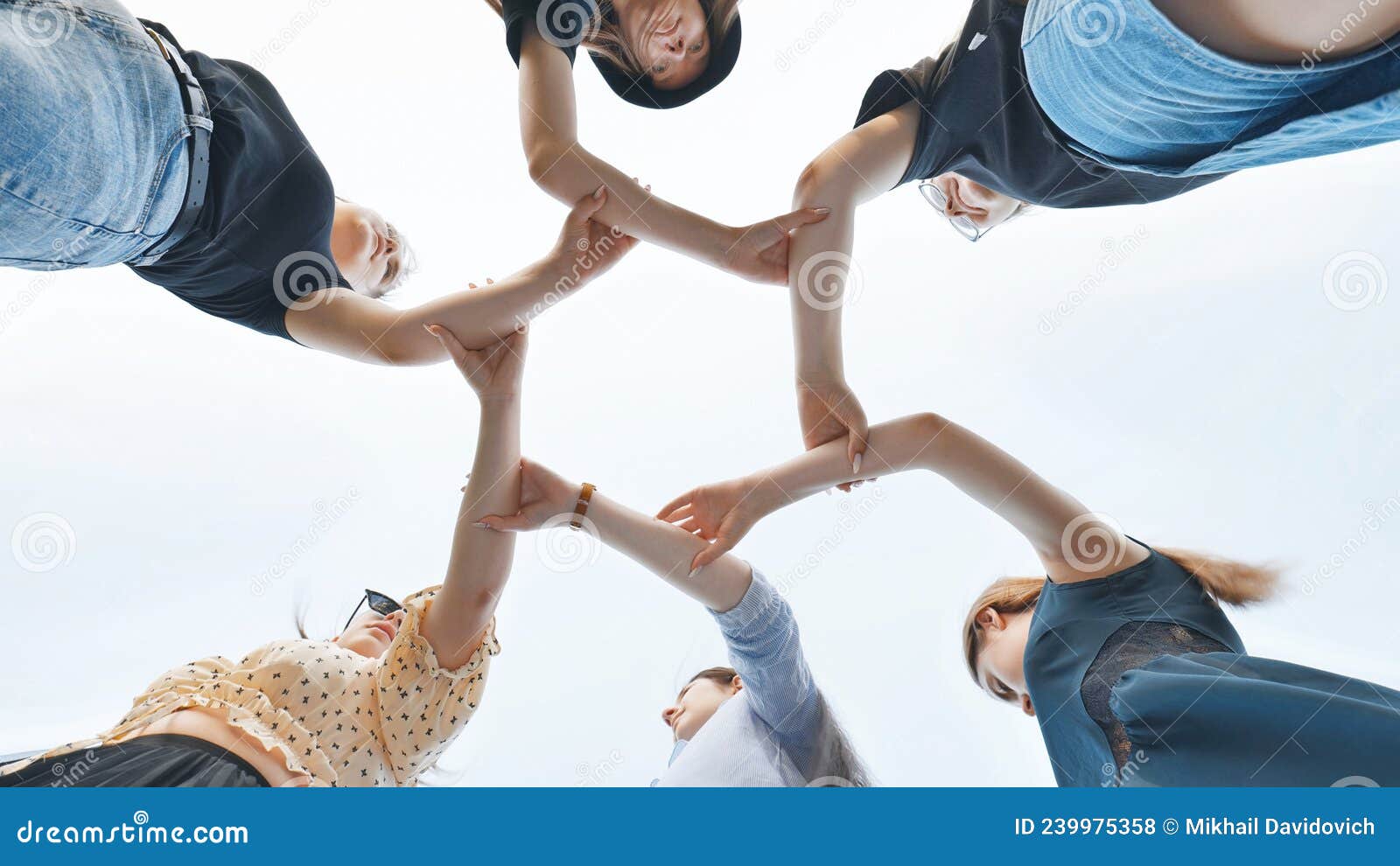 The Girlfriends Join the Wrists in the Center Making a Circle Shape ...