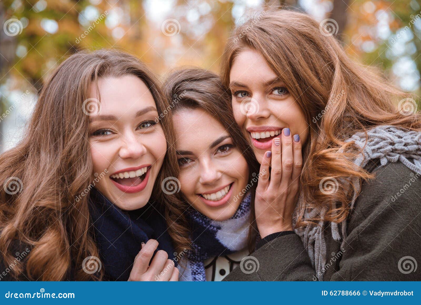 Girlfriends Looking At Camera Outdoors Stock Photo - Image: 62788666