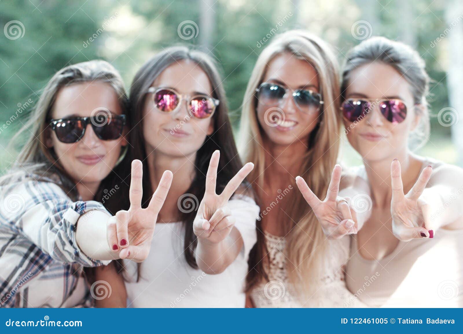 Girlfriends showing v sign stock image. Image of young - 122461005