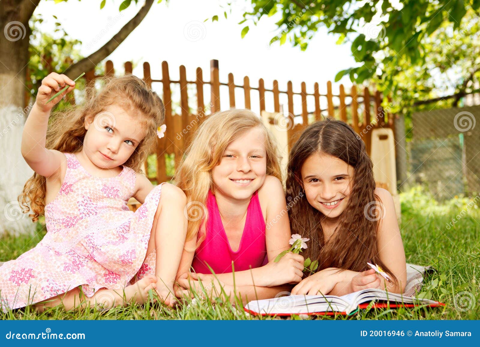 Girls in the backyard stock photo. Image of green, happy - 20016946
