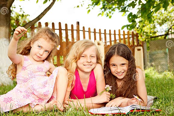 Girls in the backyard stock photo. Image of green, happy - 20016946