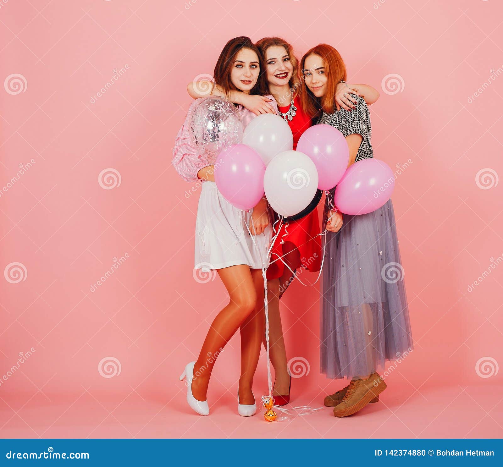 Girls with balloons stock photo. Image of ballon, isolated - 142374880