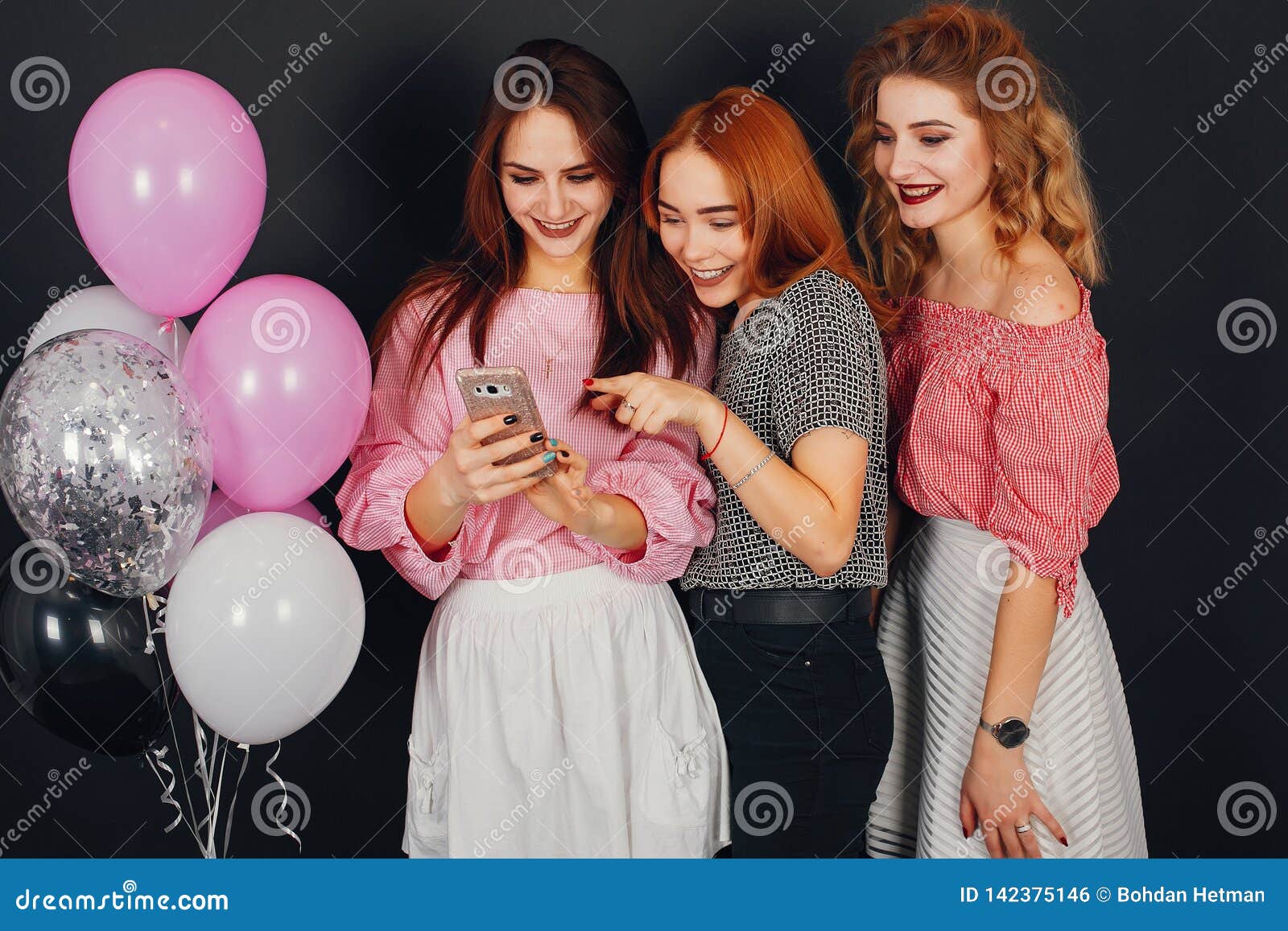 Girls with balloons stock photo. Image of celebrate - 142375146