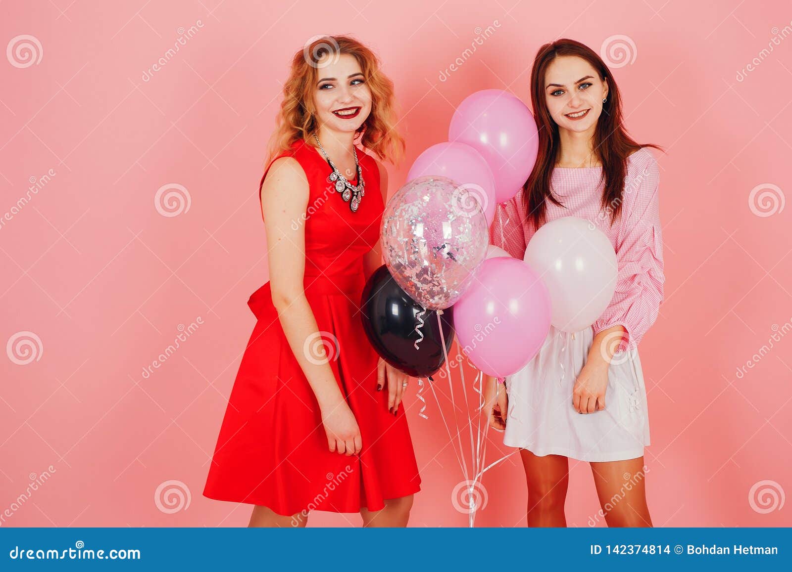 Girls with balloons stock photo. Image of celebrate - 142374814