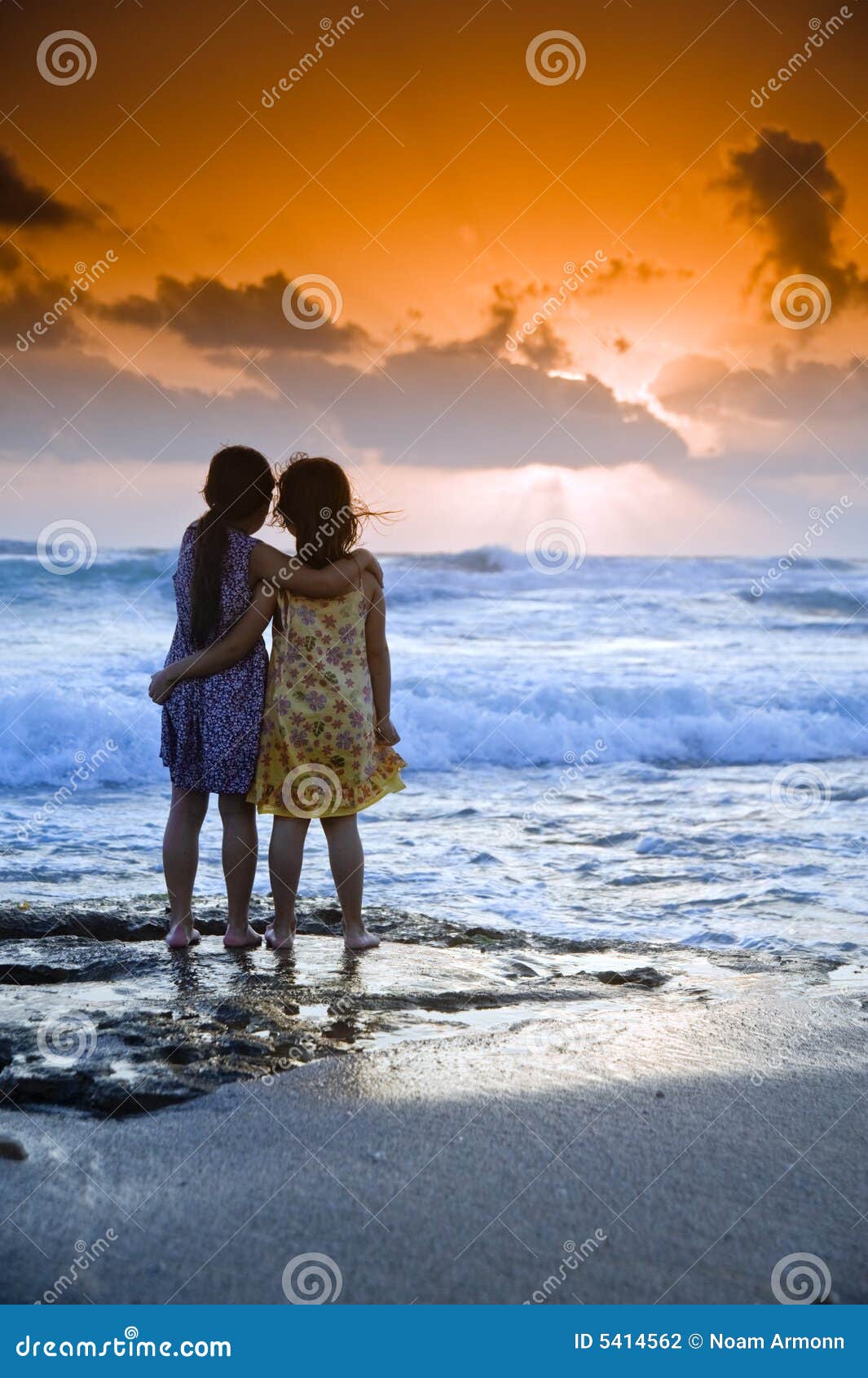 Girls beach sunset stock photo. Image of orange, outside - 5414562