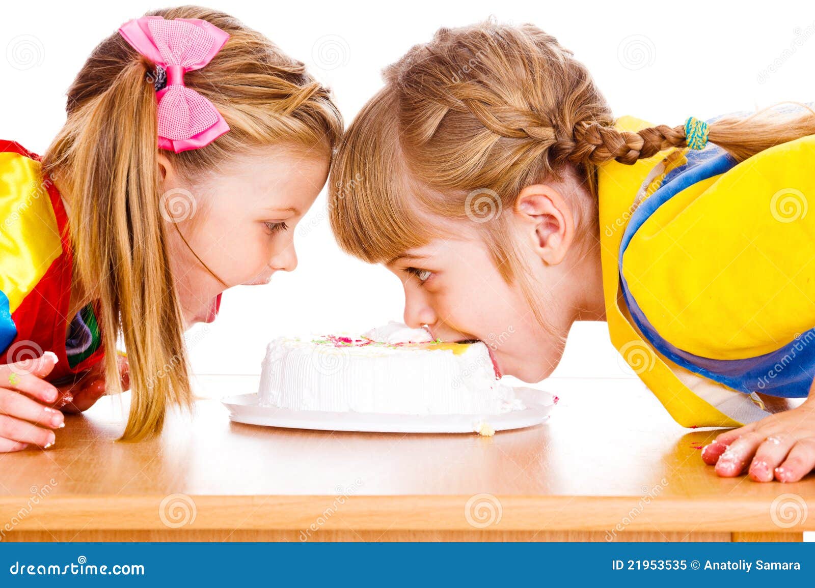 Girls biting cake stock image. Image of cake, celebrating - 21953535