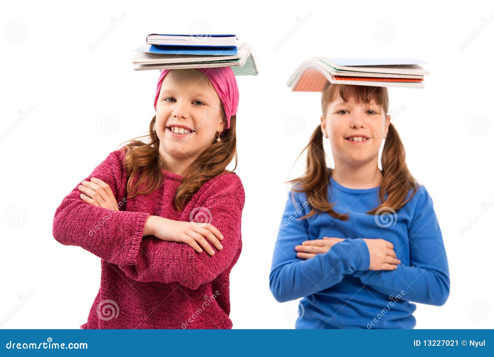 Girls with books on head stock image. Image of enjoy - 13227021