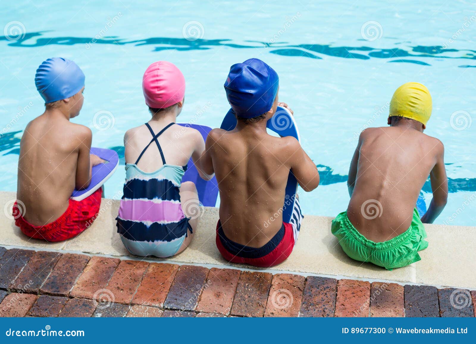Girls and Boys Sitting at Poolside Stock Photo - Image of poolside ...