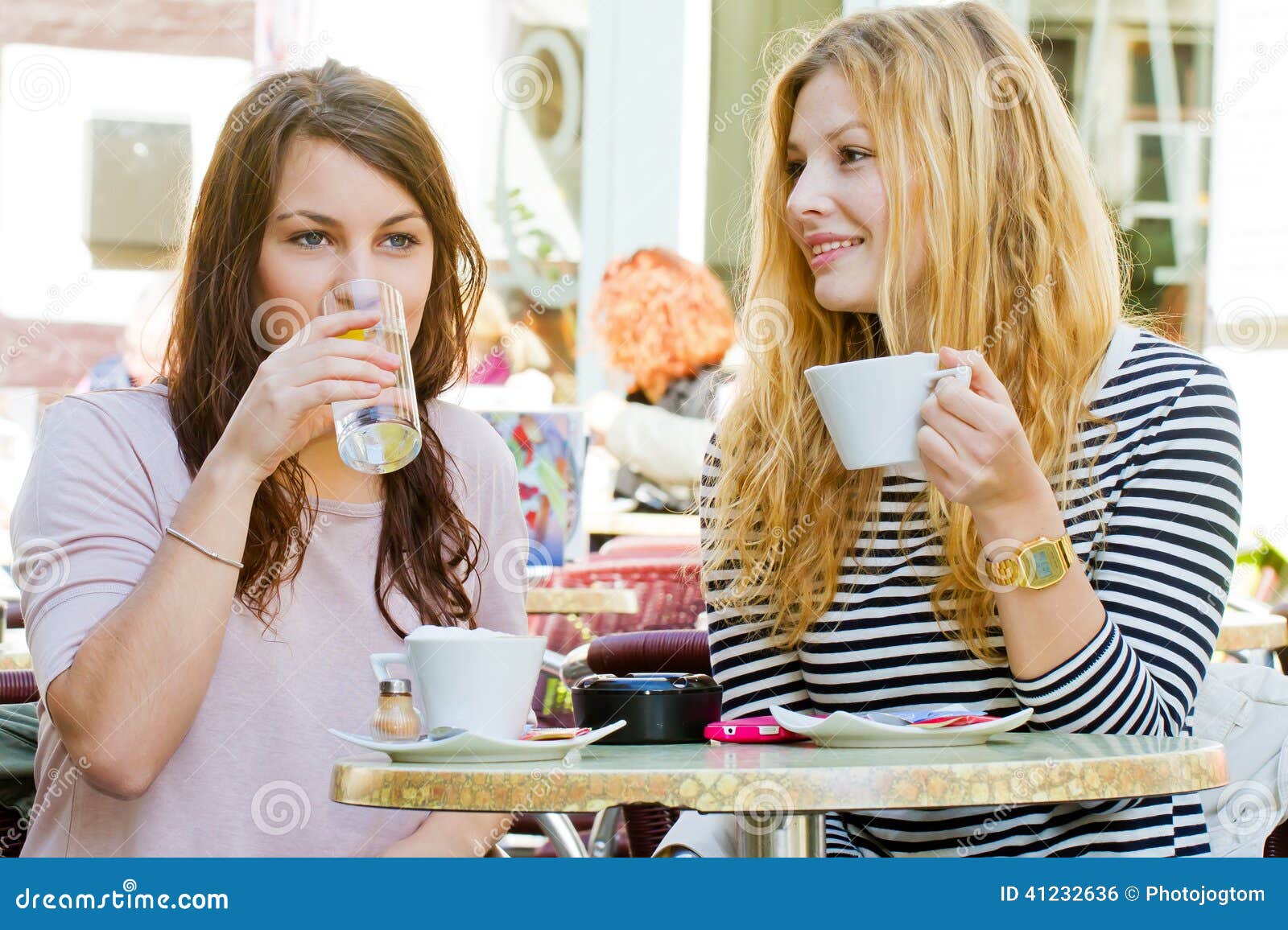 Girls in a cafe stock photo. Image of girlfriends, attractive - 41232636