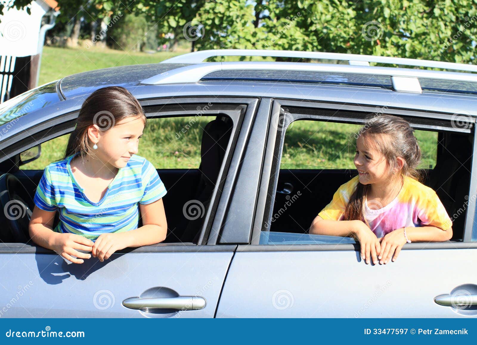 Girls in car windows stock image. Image of children, opened - 33477597