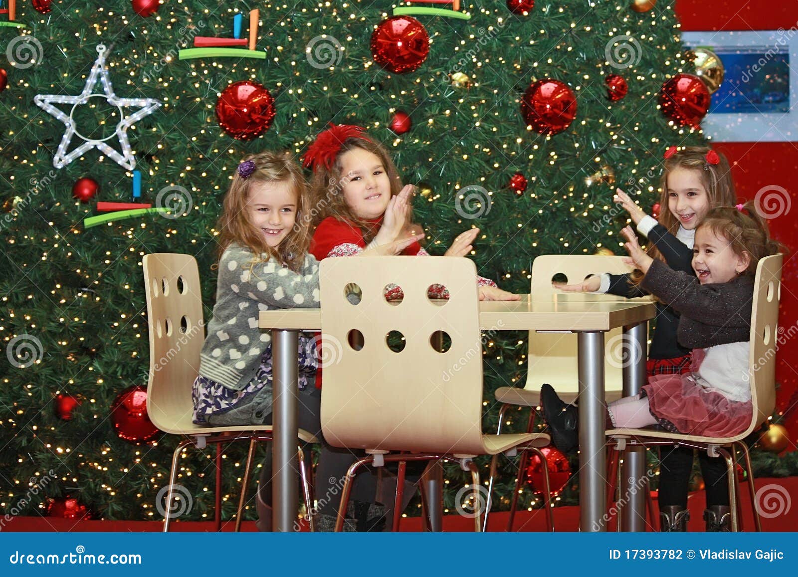 Girls and christmas-tree stock photo. Image of holiday - 17393782