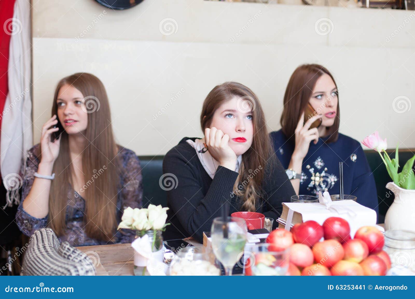 Girls in Coffee Shop Talking on Cell Phone Stock Image - Image of ...
