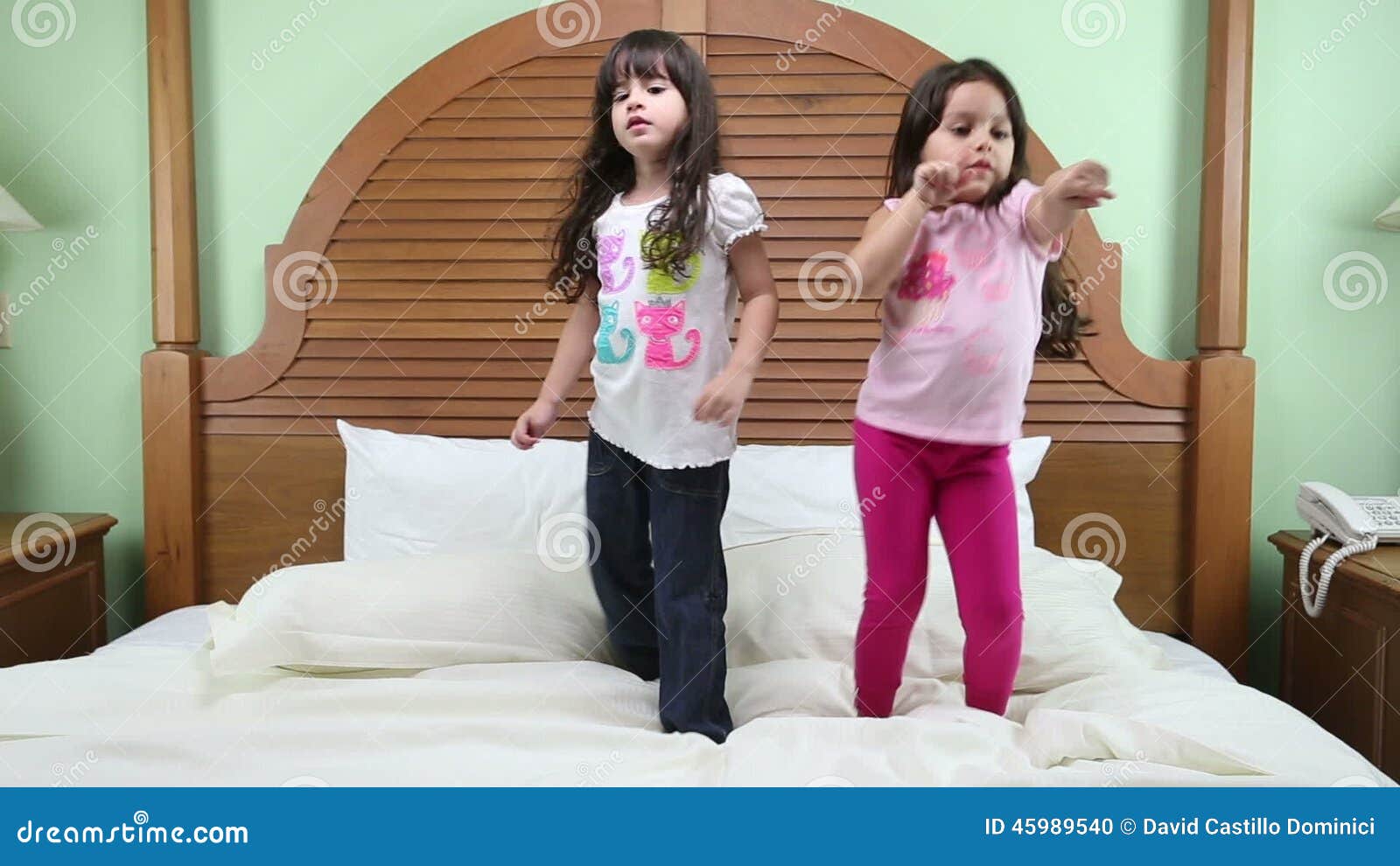 Girls dancing in the bed stock footage. Video of expressing - 45989540